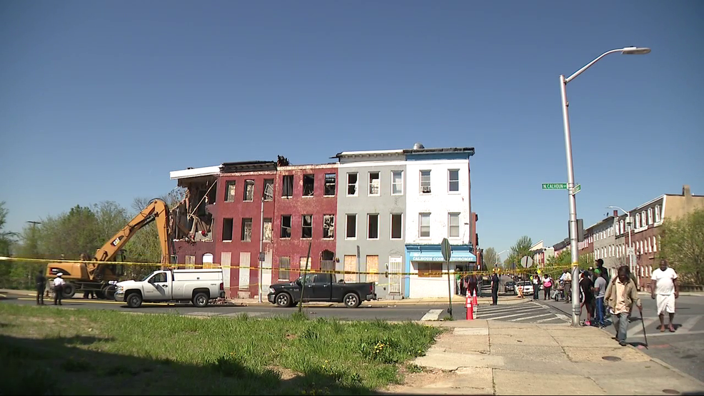 Body falls out of house being demolished in west Baltimore | WBFF
