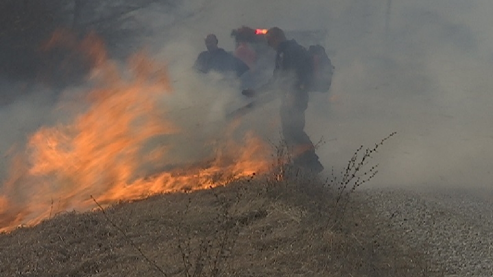 Strong winds spread fire across acres of farmland | KTVO